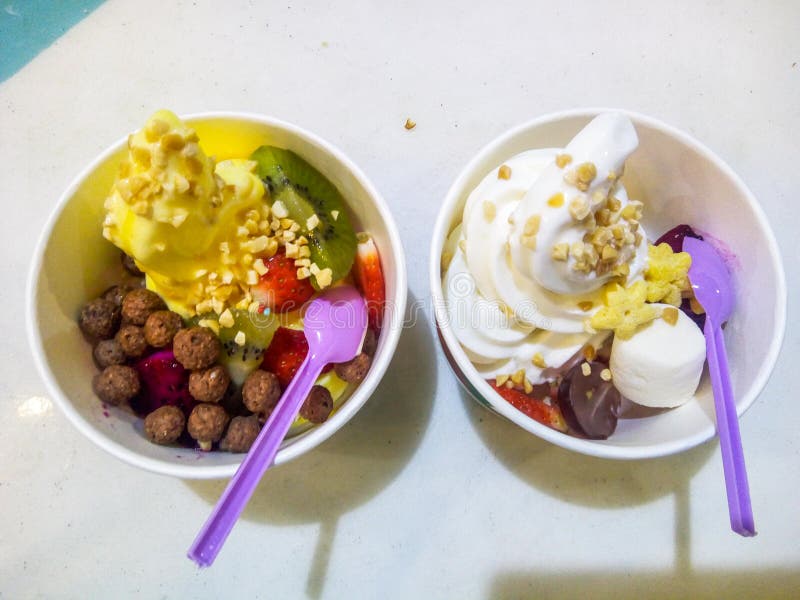 Vanilla Ice Cream and Mango Ice Cream with Various Toppings Stock Photo ...