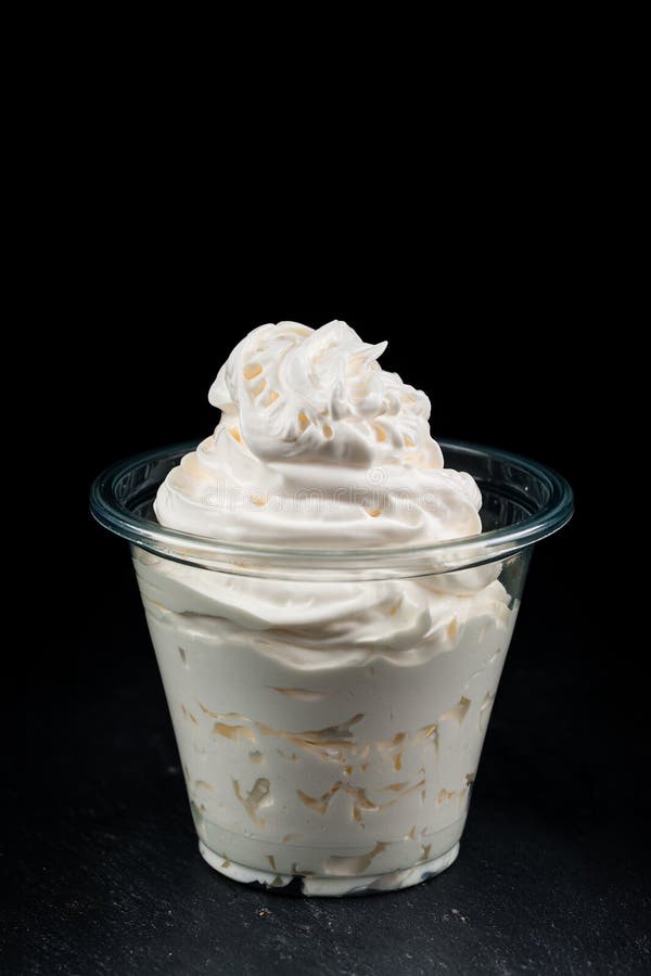 Take Vanilla Ice Cream with the Ice Cream Spoon from the Ice Cream Box ...