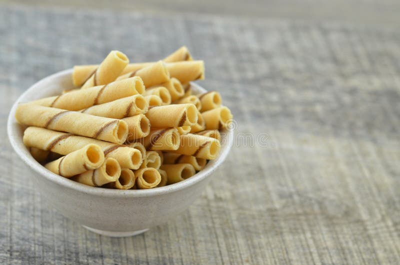 Vanilla Waffle Roll Sticks in Ceramic Bowl Stock Photo - Image of ...