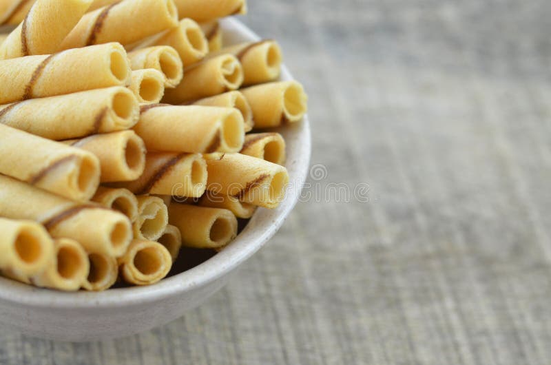 Vanilla Waffle Roll Sticks in Ceramic Bowl Stock Photo - Image of ...