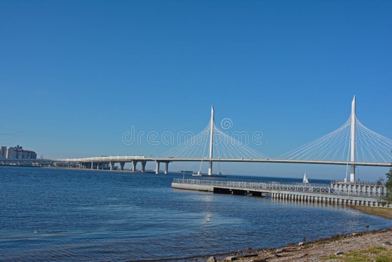 Vansu Bridge. Across a Large River Against a Bright, Clear, Blue Sky ...