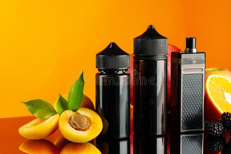 Vape Smoking Liquid with Fruit Flavor on Orange Background Stock Photo ...