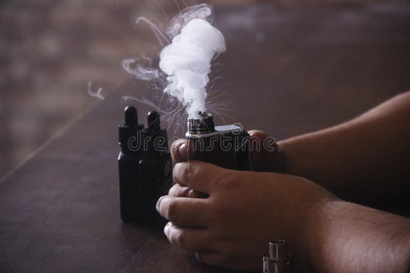 Vaping Device in in the Man`s Hand. Stock Image - Image of ecigarette ...