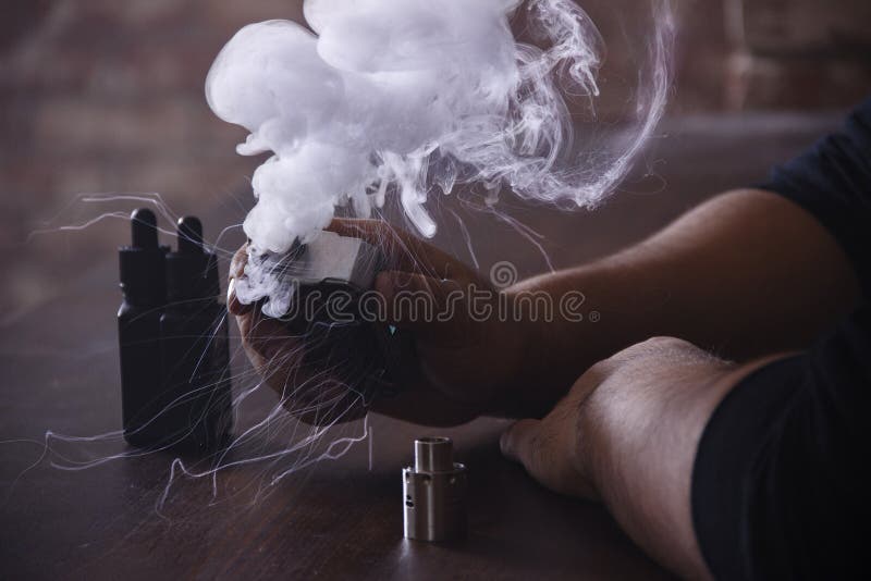 Vaping Device in in the Woman`s Hand. Stock Photo - Image of ejuice ...