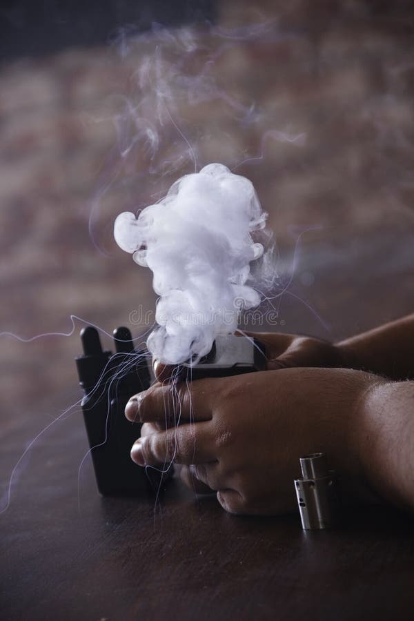 Vaping Device in in the Man`s Hand. Stock Photo - Image of cigarette ...