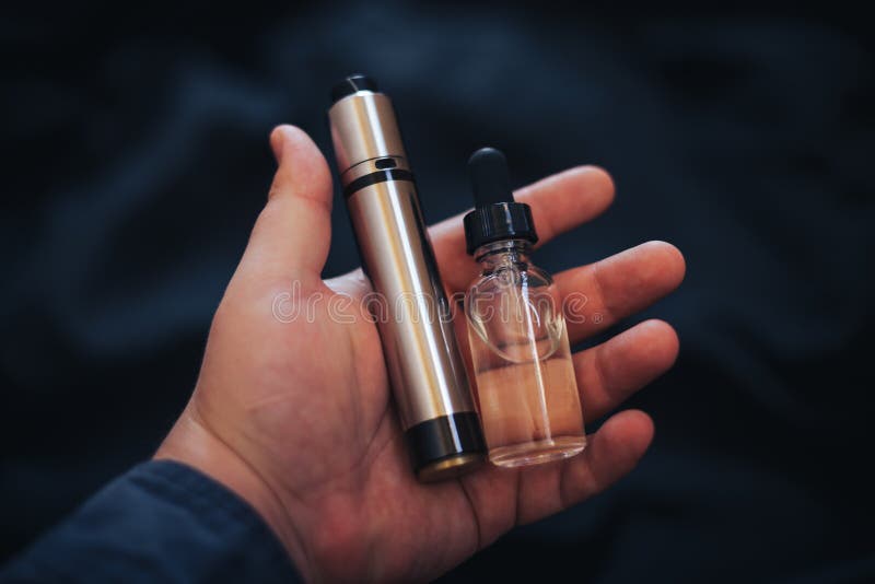 Vaping Device In In The Man`s Hand. Electronic Cigarette, Vape Stock ...