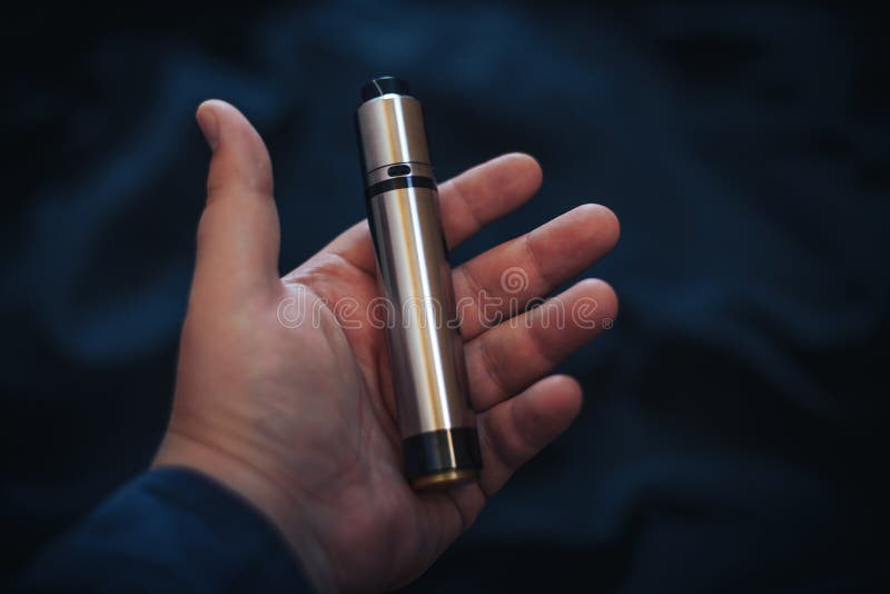 Vaping Device in in the Man`s Hand. Electronic Cigarette, Vape Stock ...