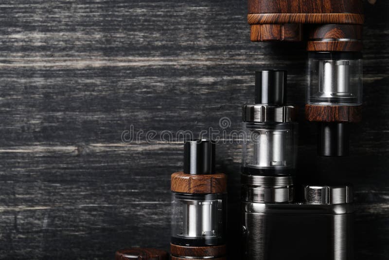 Vape or E-cigarette. Vaping Set on the Table. Stock Photo - Image of ...