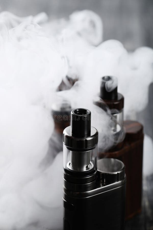 Vaping device stock photo. Image of vaping, vape, table - 95826548