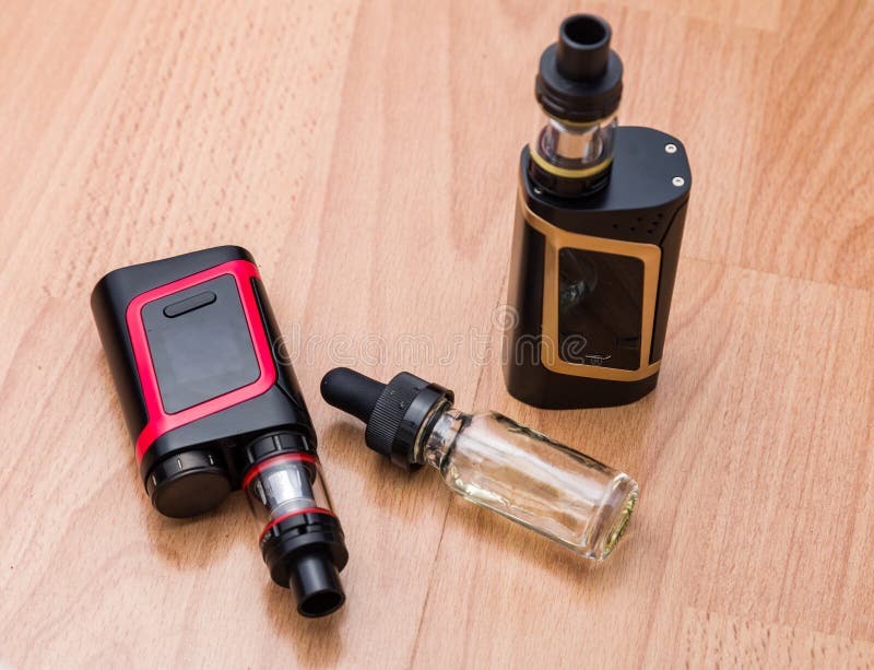 Vaping Electronic Mod and Vape Liquid. Stock Image - Image of inhale ...