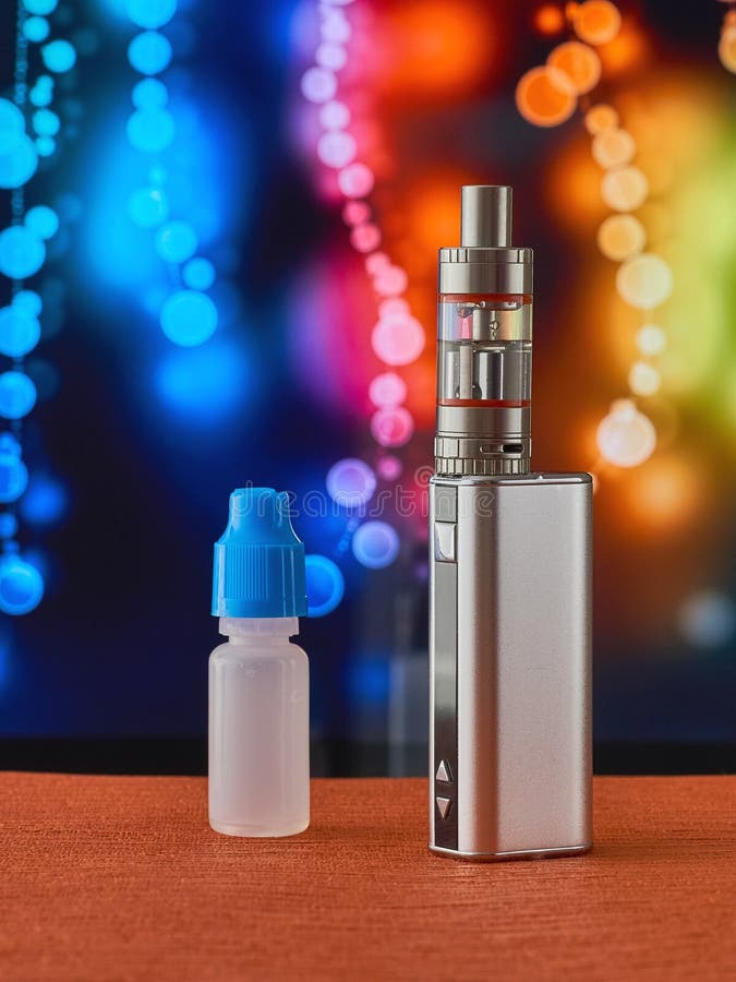 Vaping Mod E-cig with Tank Atomizer and Bottle Over Colorful Background ...