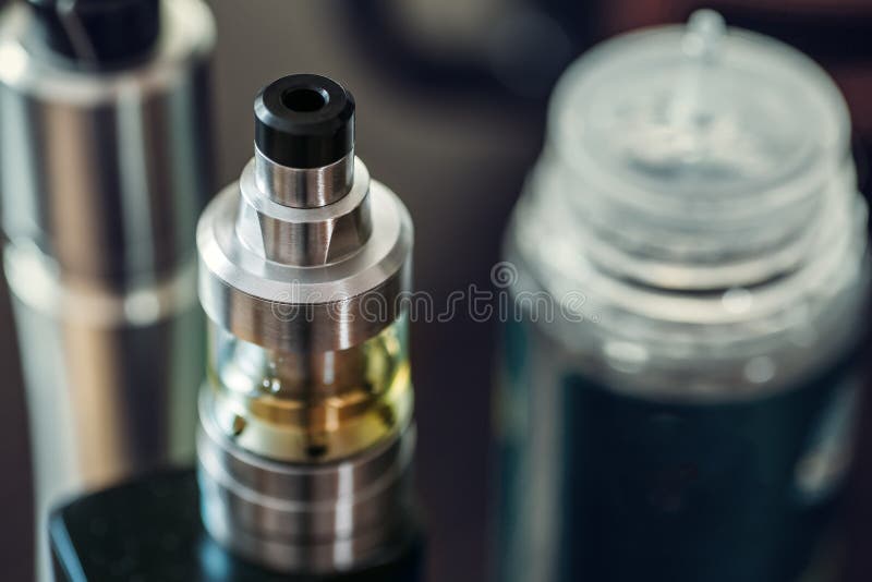 Vape or E-cigarette. Vaping Set on the Table. Stock Photo - Image of ...