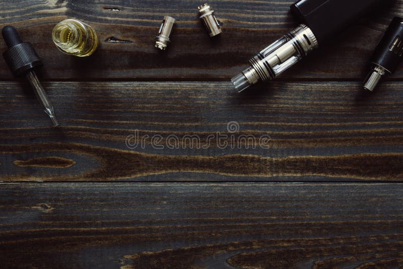 Vape or E-cigarette. Vaping Set on the Table. Stock Photo - Image of ...