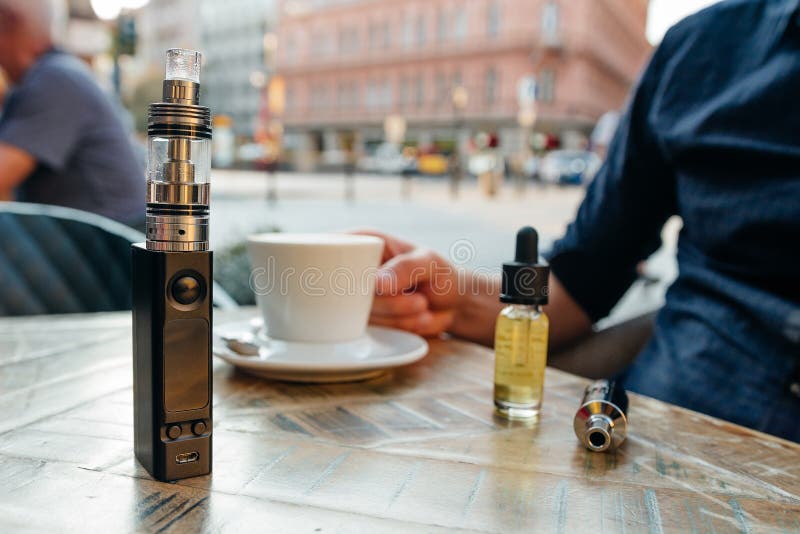 Vaping Set on the Table Against the Background of the City Stock Image ...
