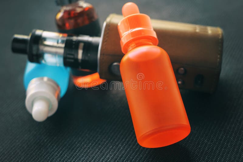 Vaping Things. E-cigarette and E-liquid with Nicotine. Stock Photo ...