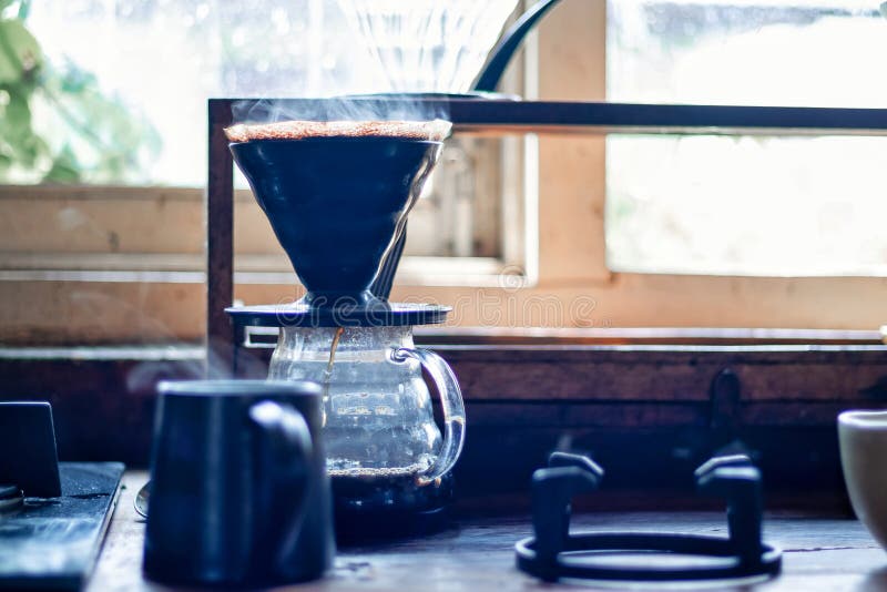 Vapor Coming Out of a Coffee Cup and Brewing Fresh Coffee in the ...