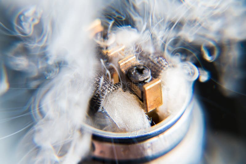 Vaporizers Vape Cloud - Close Up Stock Image - Image of modern, coil ...