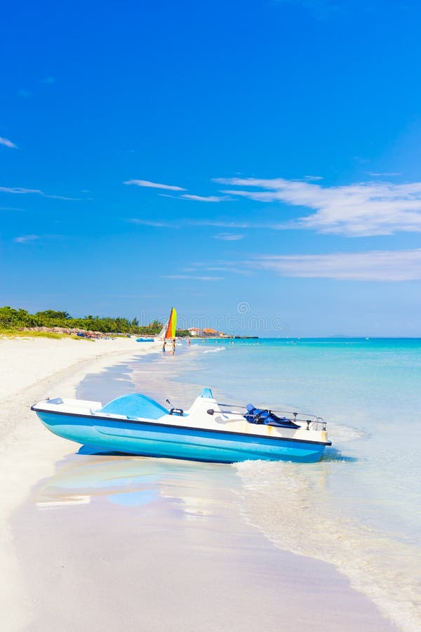 Varadero Beach in Cuba with a Paddle Boat Stock Photo - Image of hotel ...