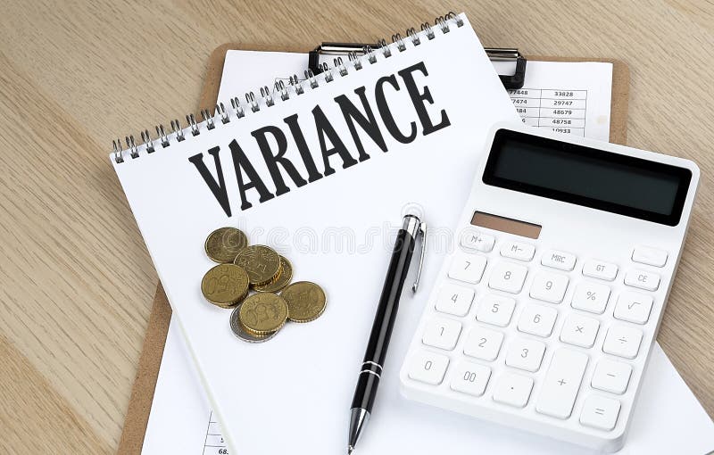 VARIANCE Text on a Notebook with Chart and Calculator and Coins ...