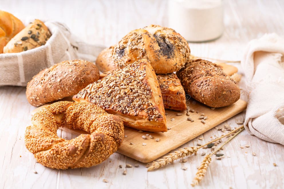 Variation of Bread Rolls or Buns in Breadbag with Butter and Assorted ...
