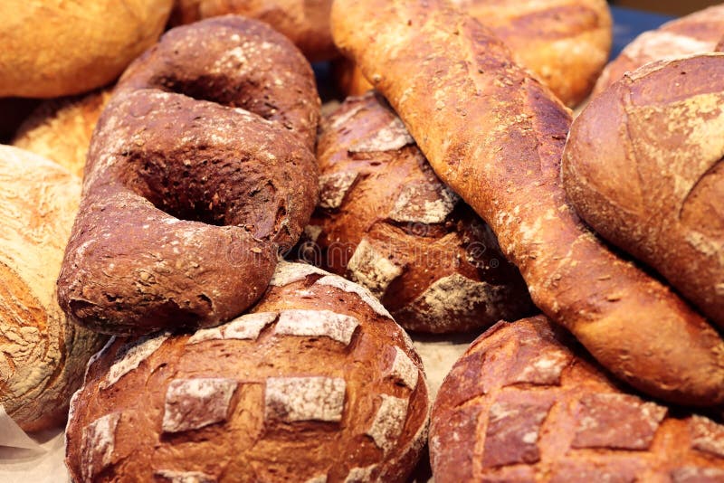 Varied Bread Loaves on a Bakery Shop Counter Stock Photo - Image of ...