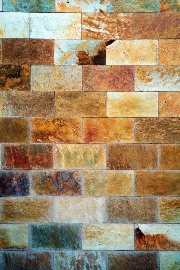 Variegated cut stone wall stock photo. Image of texture - 27835670