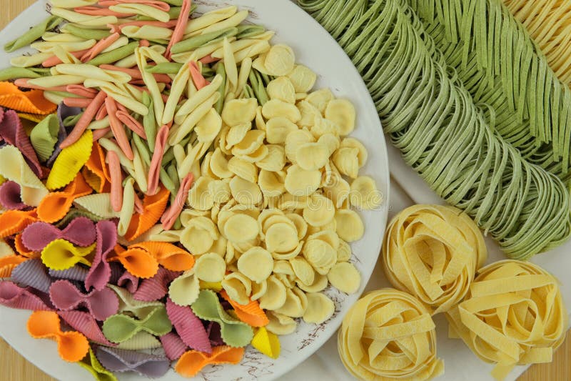 Varieties of Multi-colored Pasta. Types of Uncooked Pasta. Pattern of ...