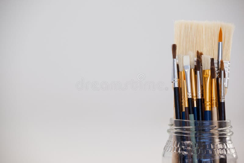 Varieties of Paint Brushes in Glass Jar Stock Image - Image of paint ...