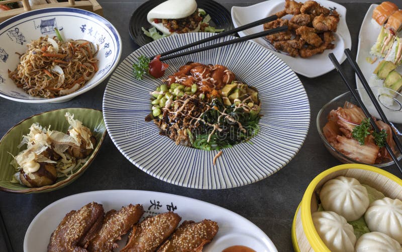 Variety of Asian Cuisine Dishes on the Table Stock Photo - Image of ...