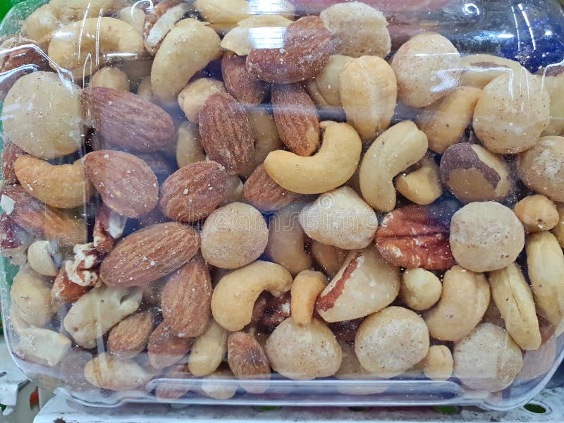 Mix nuts in a bottle stock photo. Image of varity, nuts - 309049370