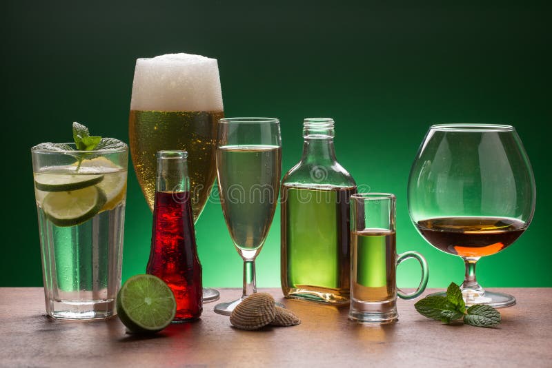 Variety of Beverages on Green Background Stock Image - Image of drink ...