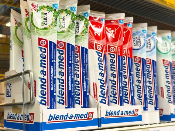 Variety of Blend-a-med Toothpaste Tubes on Display Shelf in Store ...
