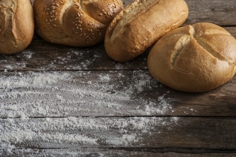 Variety of Bread on a White Wooden Table. Stock Image - Image of loaves ...