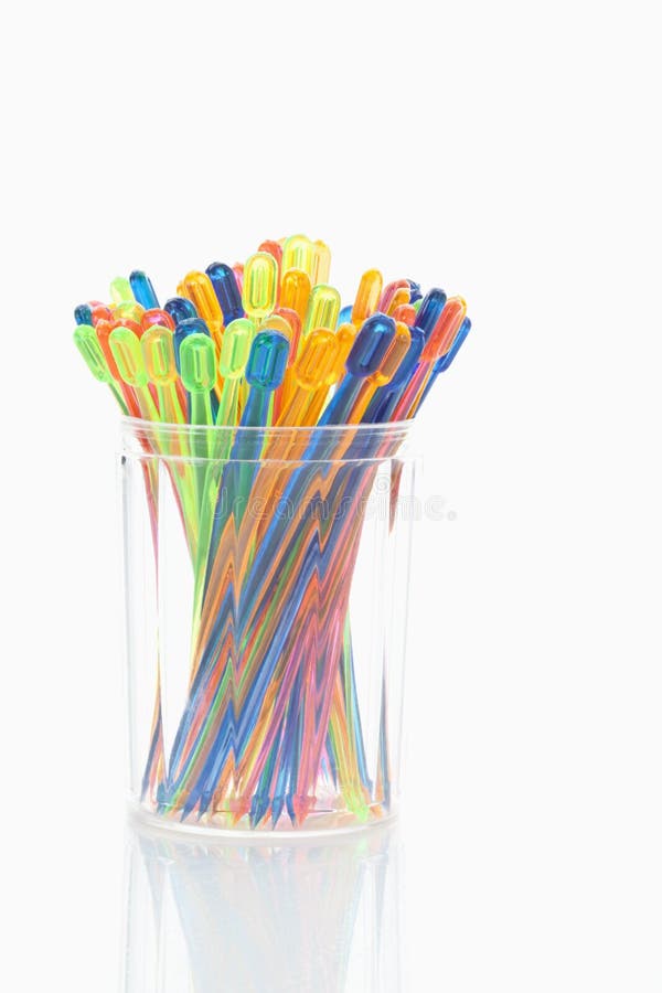 Variety of Cocktail Sticks in Plastic Container Stock Photo - Image of ...