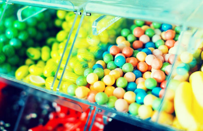 Variety of Colored Sweets on Shelves Stock Photo - Image of shop ...