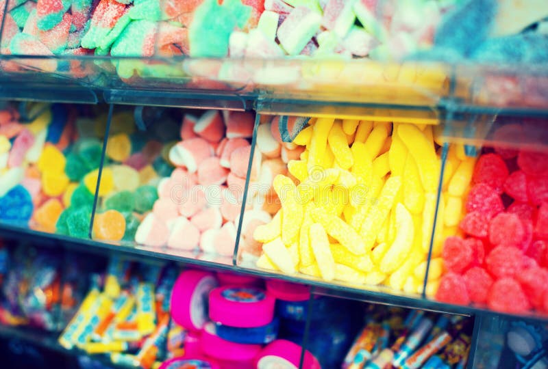 Variety of Colored Sweets on Shelves Stock Photo - Image of snack, food ...