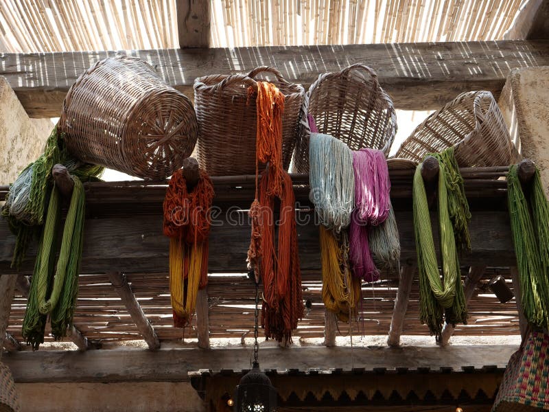 A Variety of Colored Yarn Hanging on a Shelf Stock Photo - Image of ...
