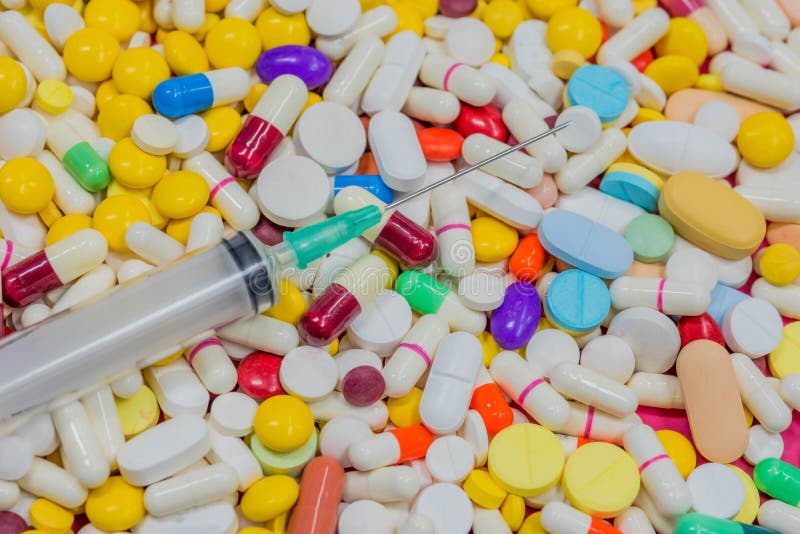 Variety of Colorful Medication and on Syring. Top View, Closeup Stock ...