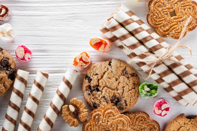 A Variety of Cookies and Sweets on a White Wooden Table Stock Image ...