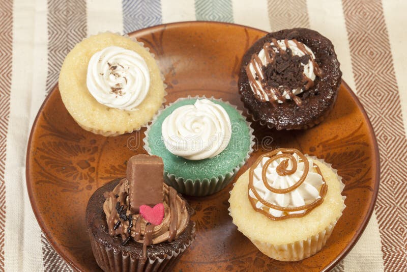 Variety of Cup cakes stock image. Image of dessert, kind - 52875255