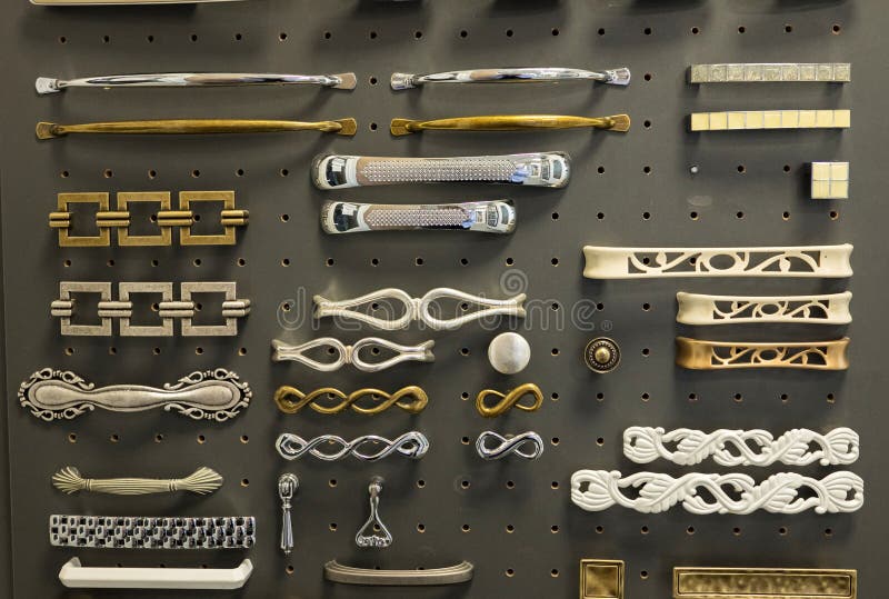Variety of Decorative Cabinet Hardware and Handles on Display Board ...