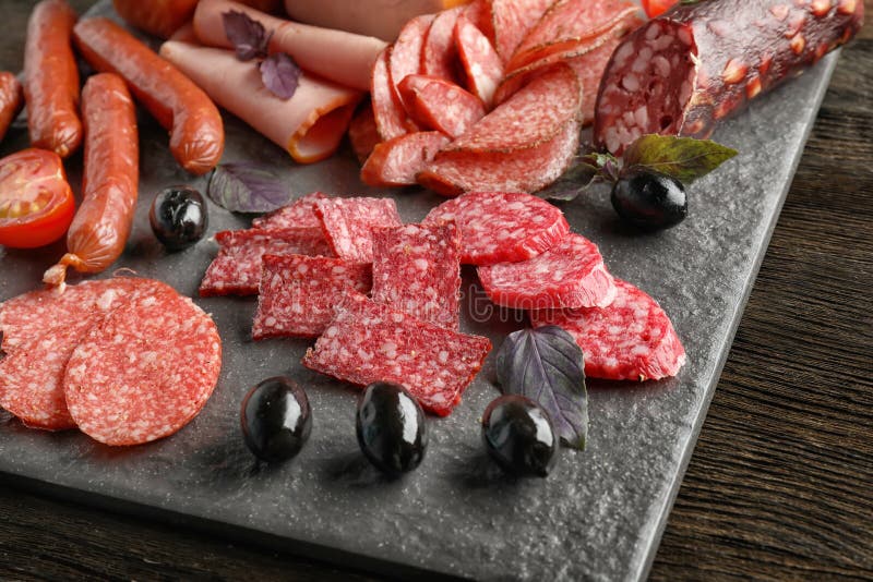 Variety of Delicious Deli Meats on Slate Plate Stock Photo - Image of ...