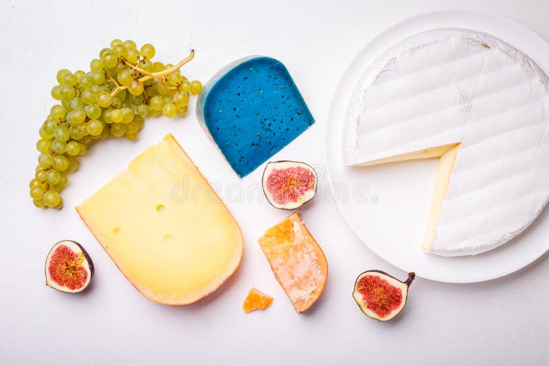 Variety of Different Cheese with Nuts on the Table Stock Image - Image ...