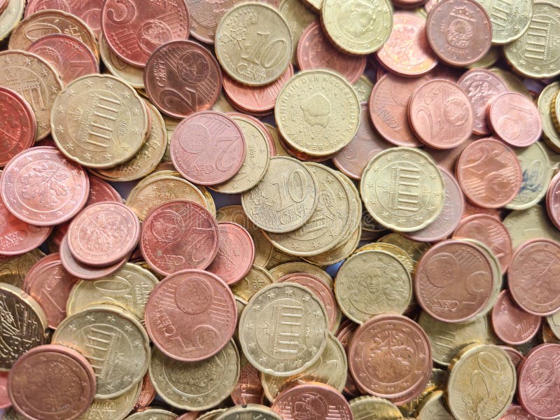 A Variety of Different Coins Piled Together, Displaying Their Unique ...
