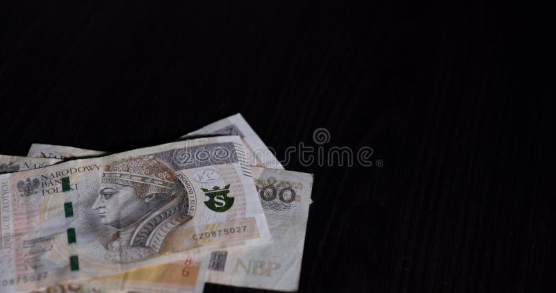 A Variety of Different Currency Notes Laid Out on a Dark Smooth Surface ...
