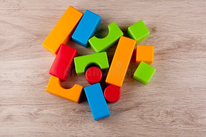 Variety of Different Plastic Toy Blocks on Table Stock Photo - Image of ...