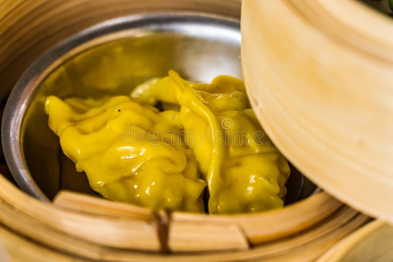 Variety of Dim Sum in Bamboo Steam Containers Stock Photo - Image of ...