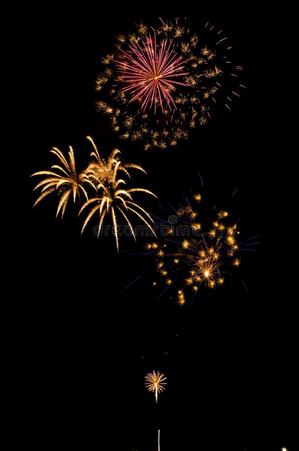 A Group of Fireworks Exploding in the Night Sky Stock Image - Image of ...