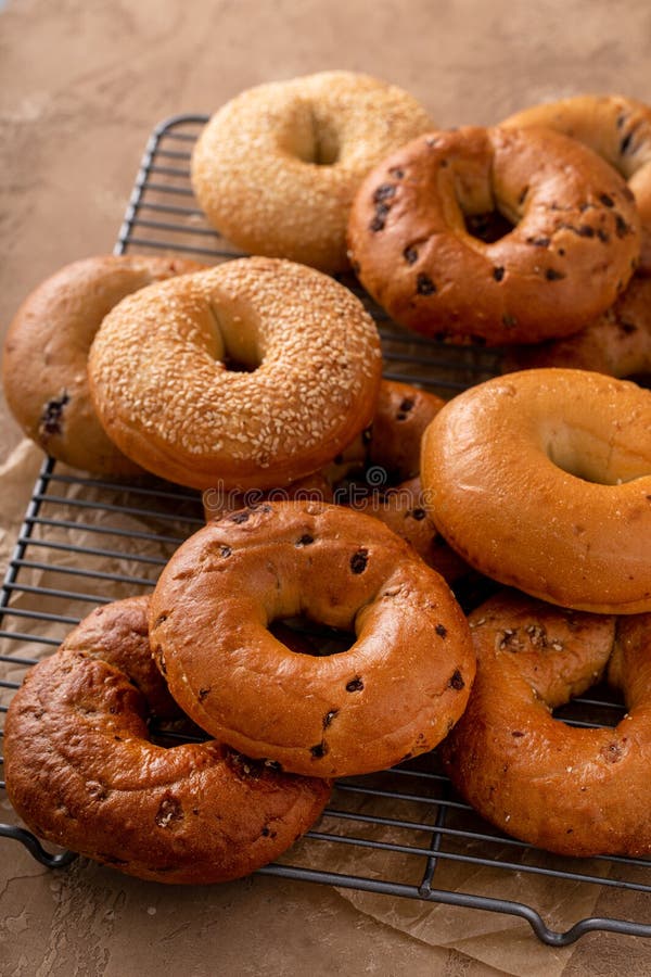 Variety of Freshly Baked Bagels on a Cooling Rack Stock Image - Image ...