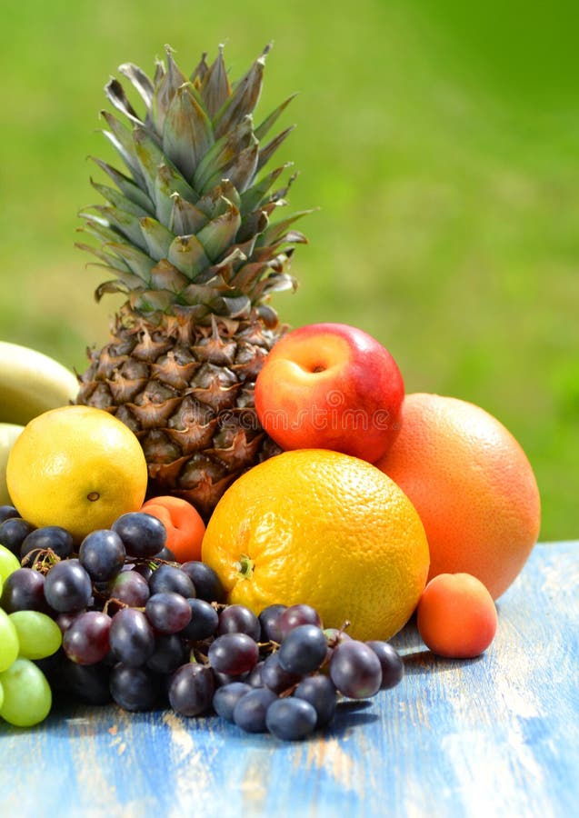 Variety of Fruits on Table in the Garden Stock Photo - Image of ...
